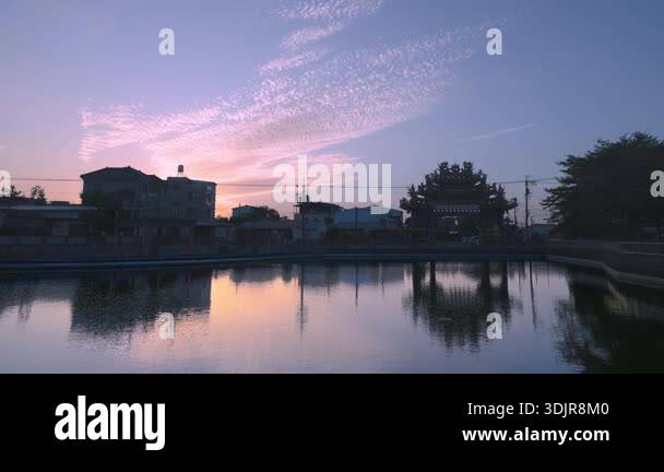 A serene twilight scene in Shanhua, Tainan, Taiwan, featuring a ...
