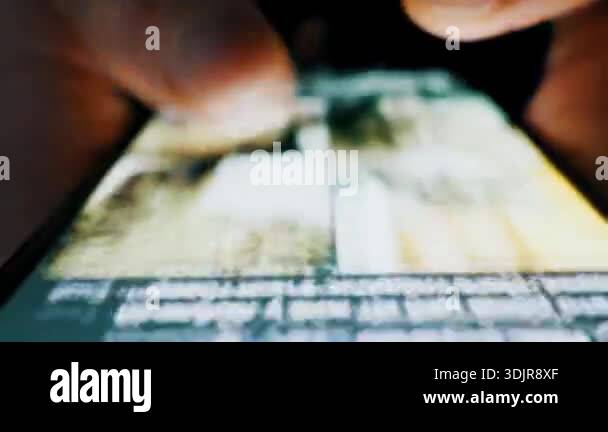 Fingers rapidly scroll through a social media feed on a smartphone in a ...
