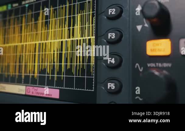 Digital oscilloscope screen displaying a complex yellow signal waveform ...