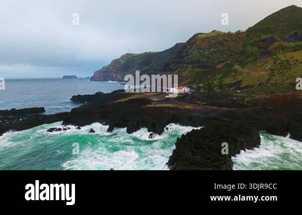 Aerial view of Ponta da Ferraria hot springs and the dramatic Atlantic ...