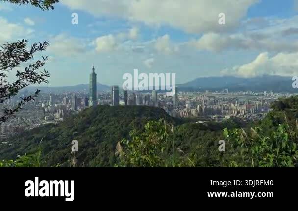 City skyline with mountains and blue sky. Taipei, Taiwan Stock Video ...