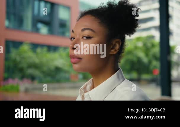 Portrait African American business woman looking away turning look at ...