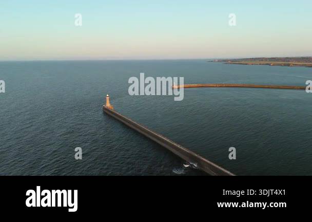 Tynemouth England: 16-08-2025: Sunset casts a warm glow over Tynemouth ...