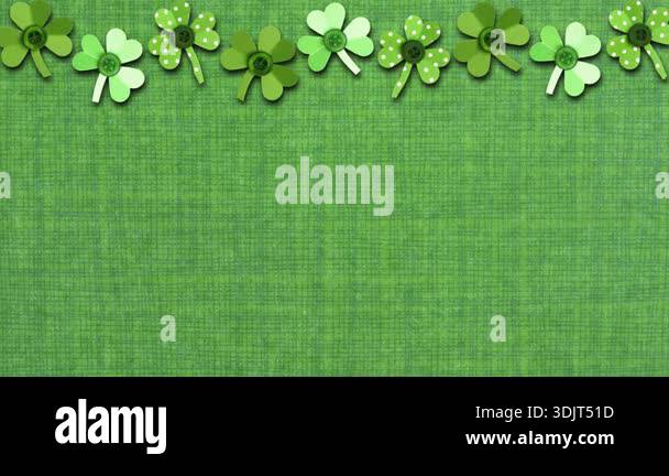 St Patricks Day top border of moving handmade paper button shamrocks ...