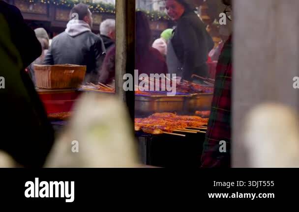 Grill Stall With Master Cooking Sizzling Sausages Over Open Flame ...