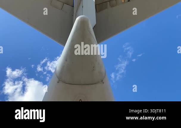 Close-up view shows the smooth tail cone of an aircraft with the tail ...