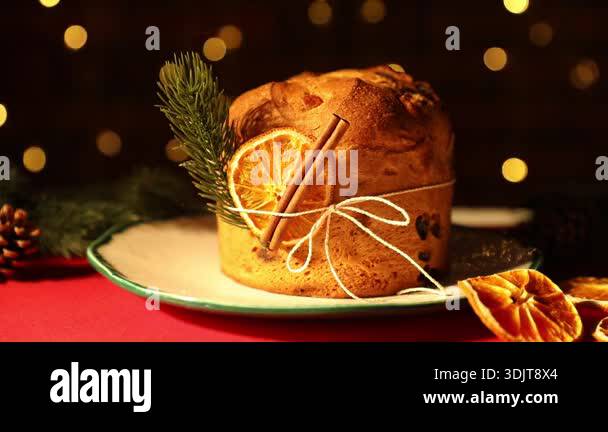 Christmas food. Delicious Panettone cake, spices and festive decor on ...