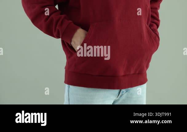 Man with hidden spy camera in his pocket on grey background, closeup ...