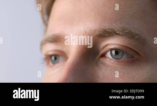 Man with beautiful eyes on light grey background, closeup Stock Video ...