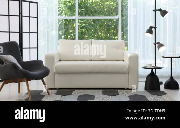 Beautiful living room with lamp and stylish furniture. Interior design ...