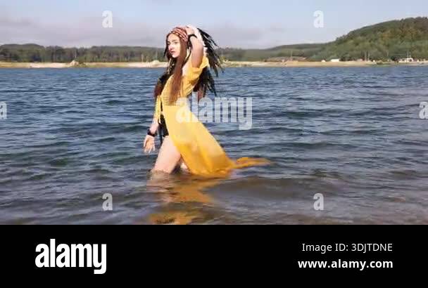 Beautiful shaman woman in native American Indian headdress with face ...