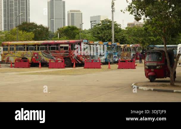 Row of colorful decorated buses parked at a bus terminal in Sri Lanka ...