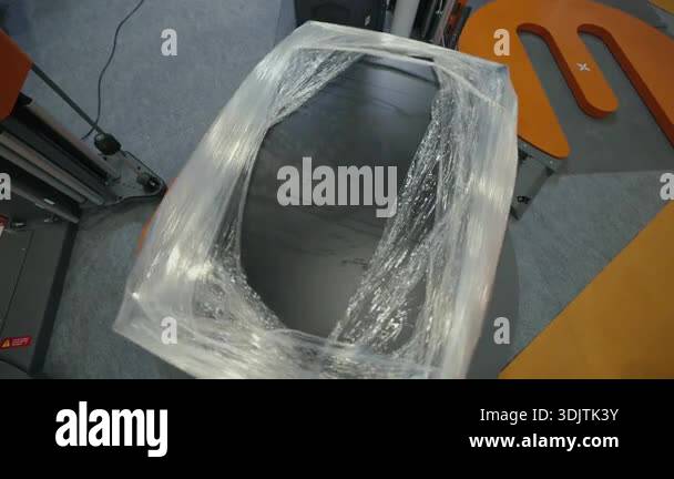Partial wrapping of a load with transparent stretch film on an ...