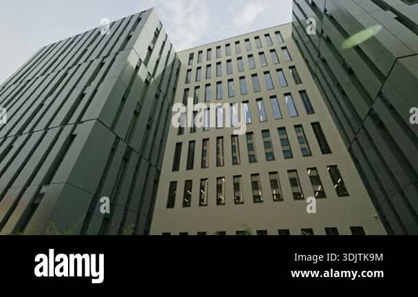 Static view with slow horizontal pan from left to right showing modern ...