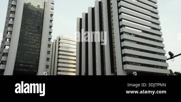 Modern office buildings with geometric decor on facades in financial ...