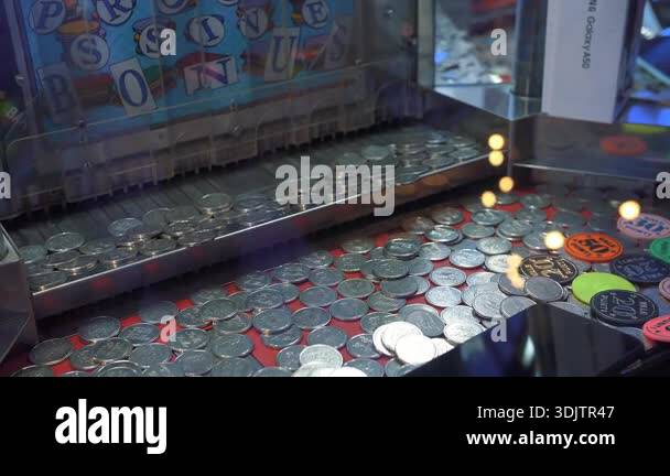 Girl walking along sandy beach by the river on a cool spring day ...