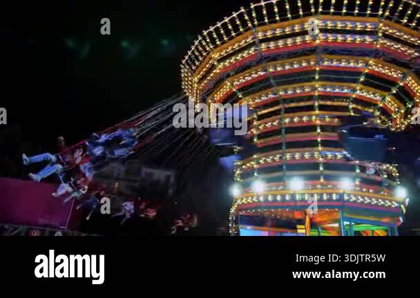 Girl walking along sandy beach by the river on a cool spring day ...