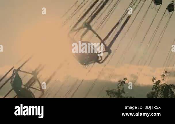 Girl walking along sandy beach by the river on a cool spring day ...