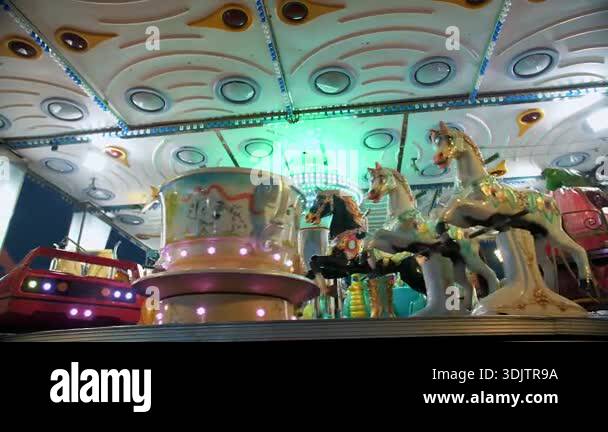 Girl walking along sandy beach by the river on a cool spring day ...