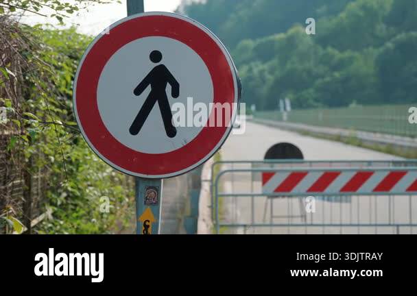 Road sign for pedestrian crossing against road repair. Black silhouette ...