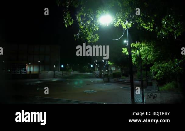 Powerful lightning strike illuminating night city sky during heavy ...