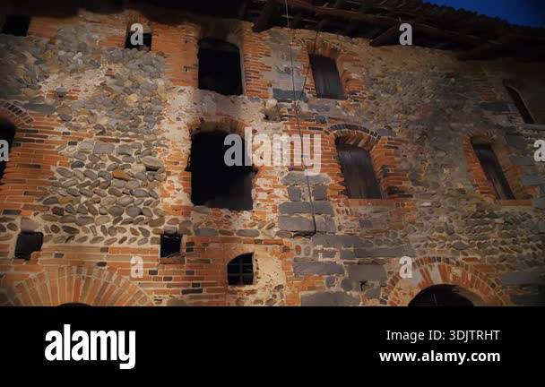 Majestic panorama of ancient stone tower and walls of Italian fortress ...