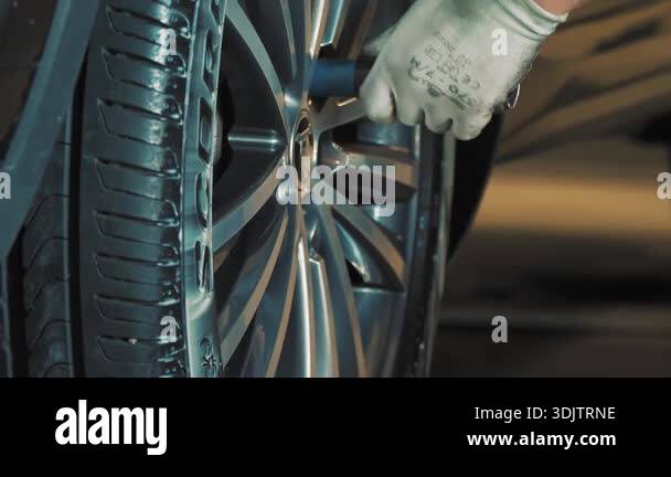 Girl walking along sandy beach by the river on a cool spring day ...