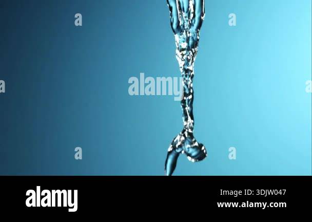 Vertical stream of crystal clear water pouring down in slow motion ...