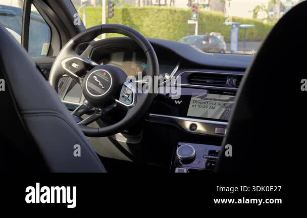 Interior view from passenger seat of autonomous Waymo Jaguar I Pace ...