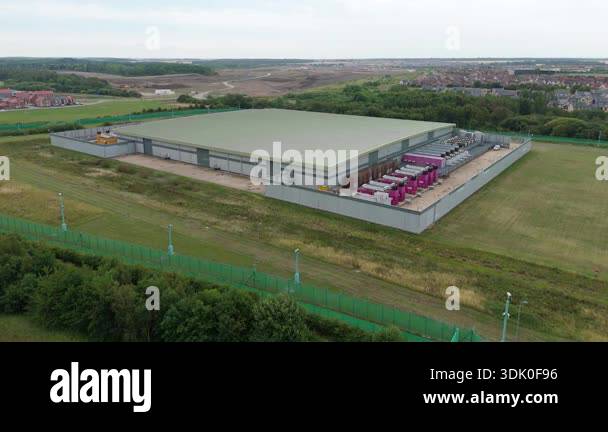 Sweeping aerial view of a state of the art data center campus for cloud ...