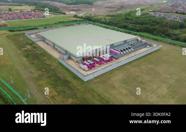Sweeping aerial view of a state of the art data center campus for cloud ...