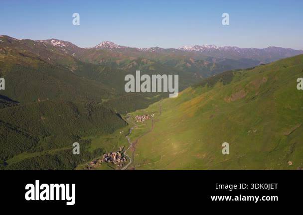 Aerial drone pans over Upper Svaneti in Georgia, revealing Svan towers ...