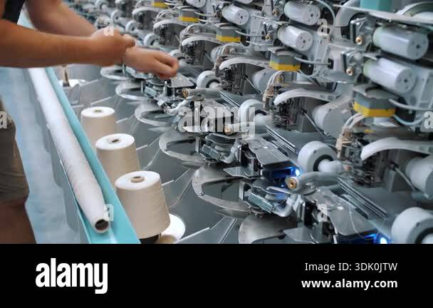 Spinning production line operating in a textile plant creating high ...