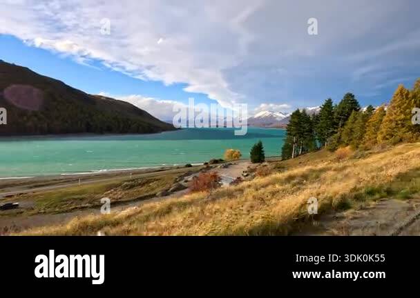 A persons hand chooses and removes a metal bar attachment from a gym ...