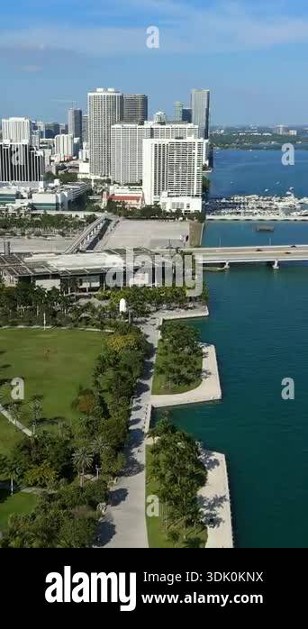 Aerial view of Miami downtown waterfront with city park modern skyline ...