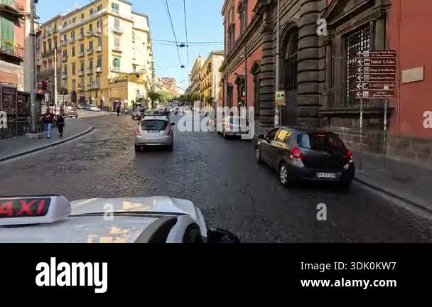 Taxi navigating busy streets of Naples, Italy Stock Video Footage - Alamy