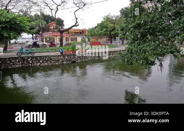 Man fishing near a riverside in Hanoi Stock Video Footage - Alamy
