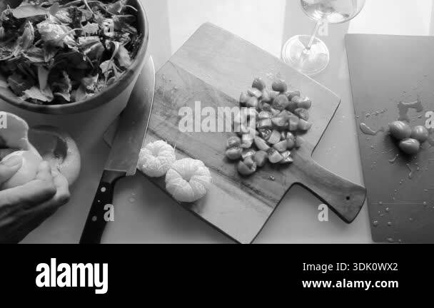 Chopping garlic on wooden cutting board Stock Video Footage - Alamy