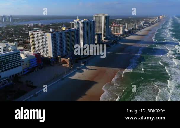 Aerial drone view of Daytona Beach Florida featuring modern high rise ...