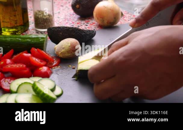 Closeup of person hands chopping vegetables in kitchen Stock Video ...
