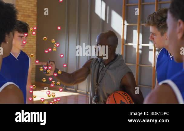 Coach gathering basketball team pointing phone streaming heart, smile ...