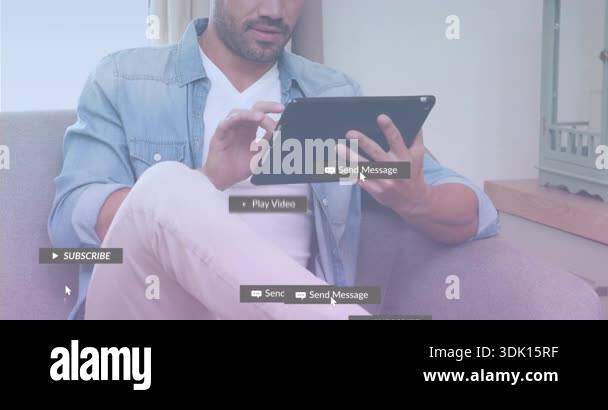 Mid man tapping tablet screen on sofa, sending message while social ...