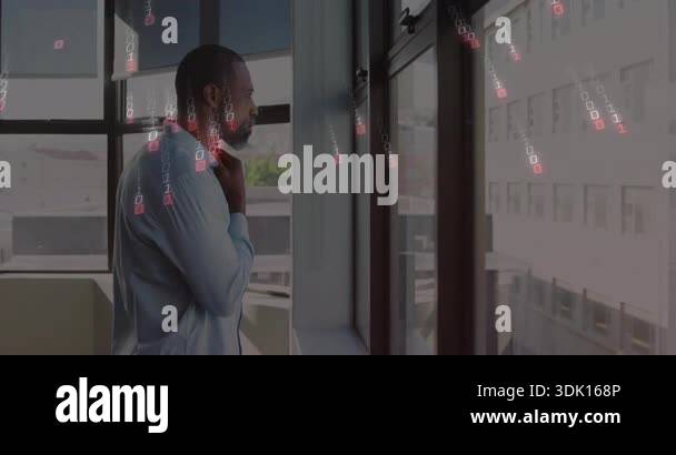 Tech professional adjusting collar at window initiating binary code ...