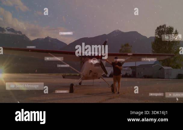 Male checking smartphone by prop plane showing floating social media ...