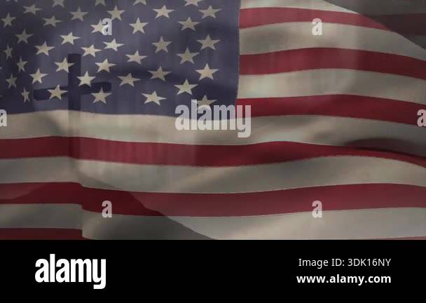 Subtle breeze kicking off US flag rippling and billowing under studio ...