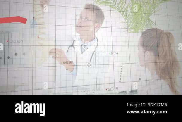 Doctor pointing at spinal chart, causing data overlays and red graph ...