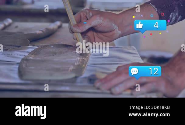 Craftsman brushing clay slip across slab, reaction icons rising ...