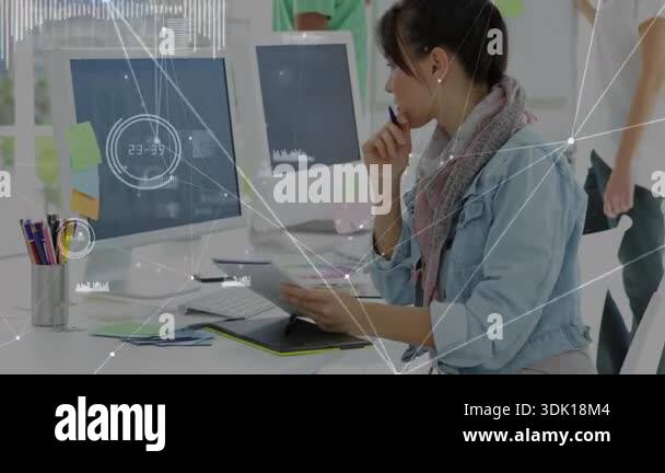 Seated woman tapping tablet starting business timeline animation while ...