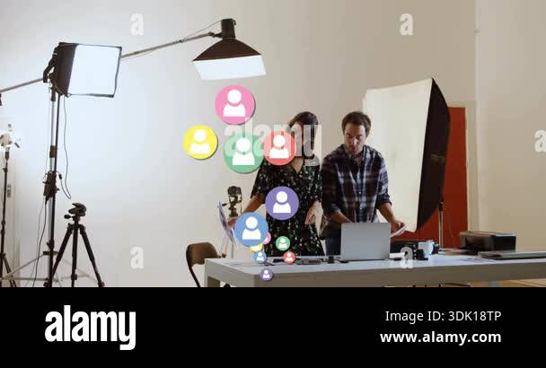 Creative duo discussing composition causing colorful user icons rising ...