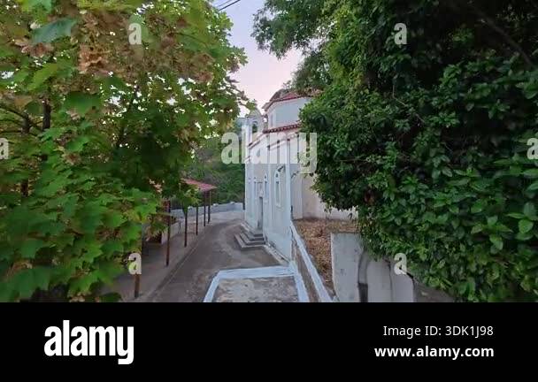 Scenic stone paths and steps lead to an Orthodox Christian church ...